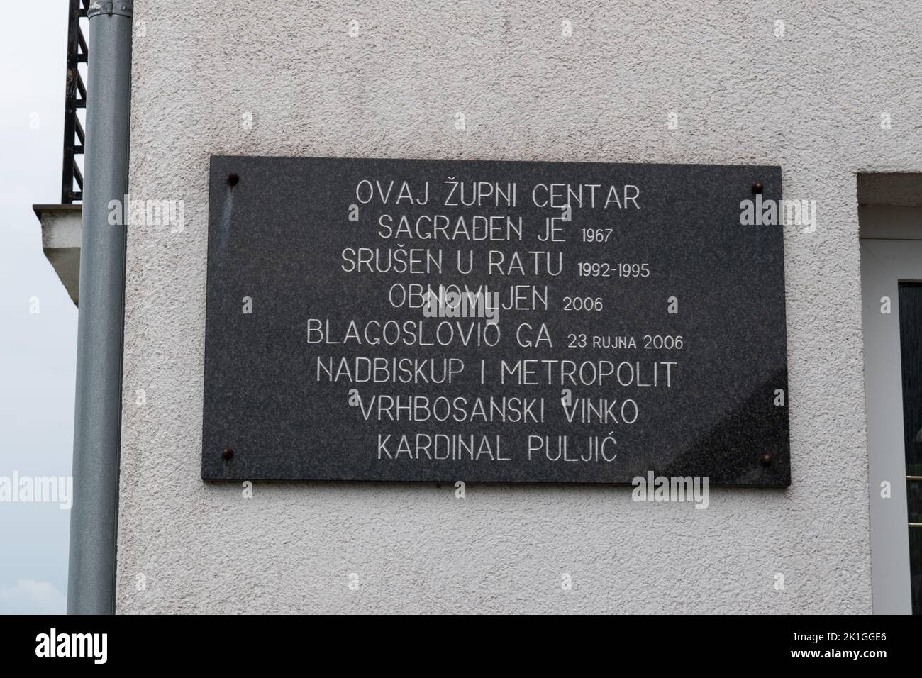 Stone tablet with inscription on parish house near church of St ...