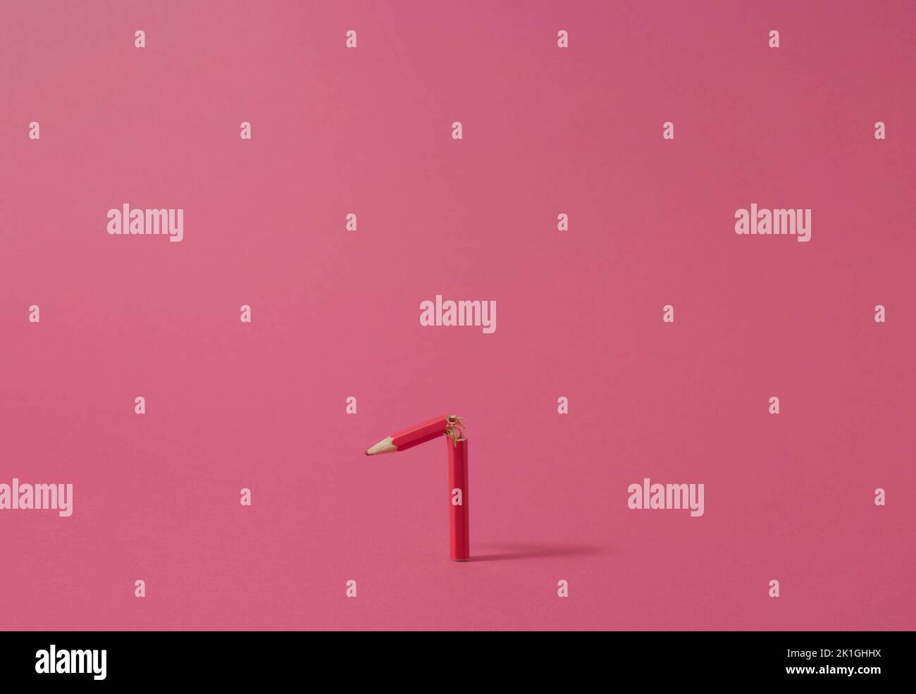Broken pink wooden crayon on the pink background. Minimal concept Stock ...