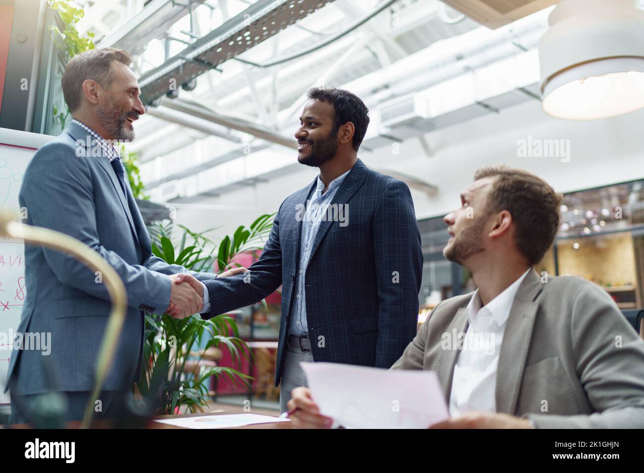 Business male partnership handshake. Photo handshaking process ...