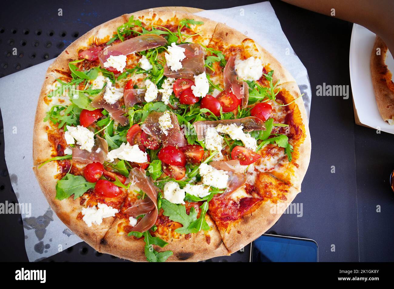 Traditional and authentic Italian pizza baked in wood fired oven. On ...