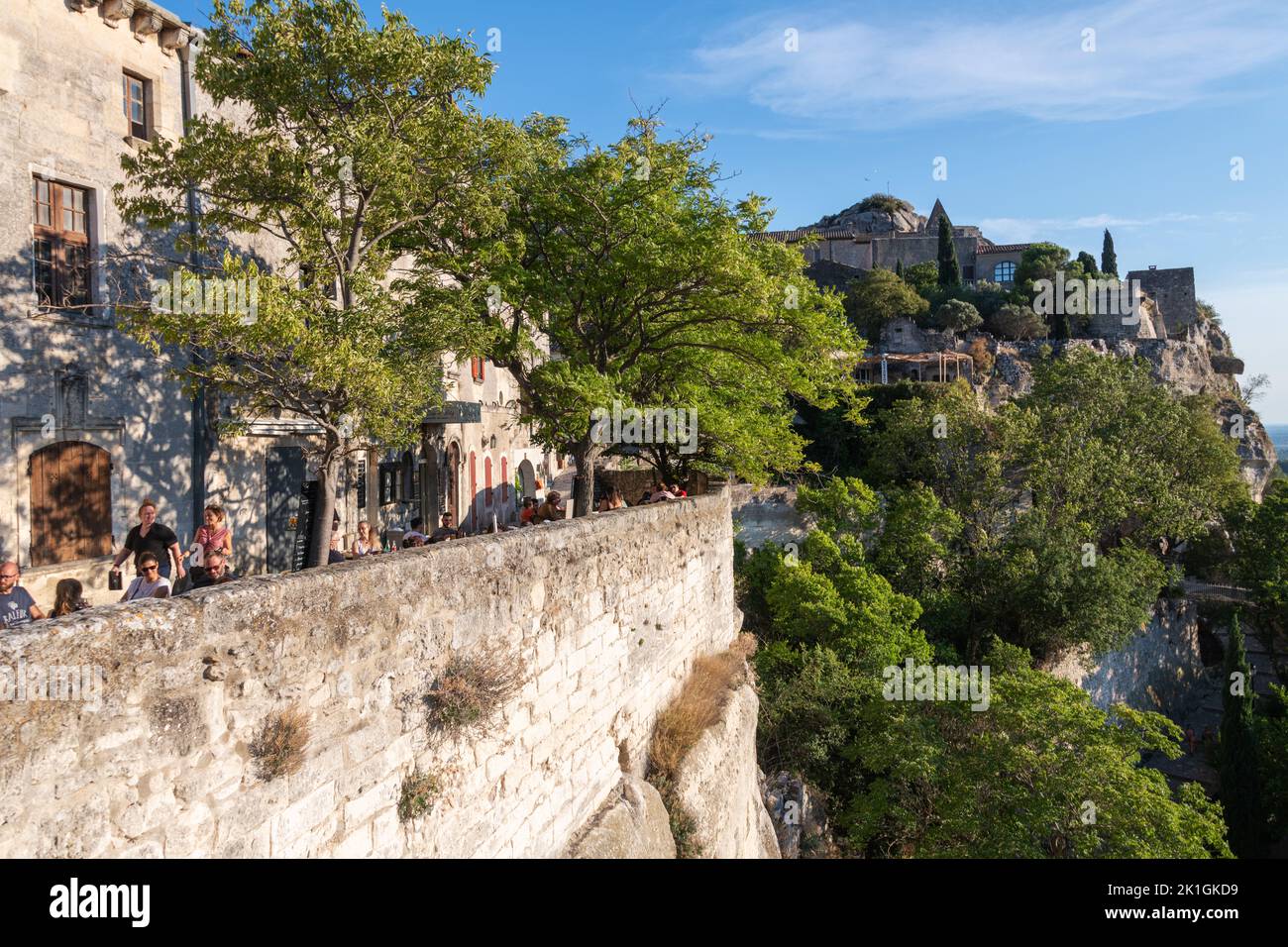 People relaxing at a cafe bar in Les Baux-de-Provence, Bouches-du-Rhone ...