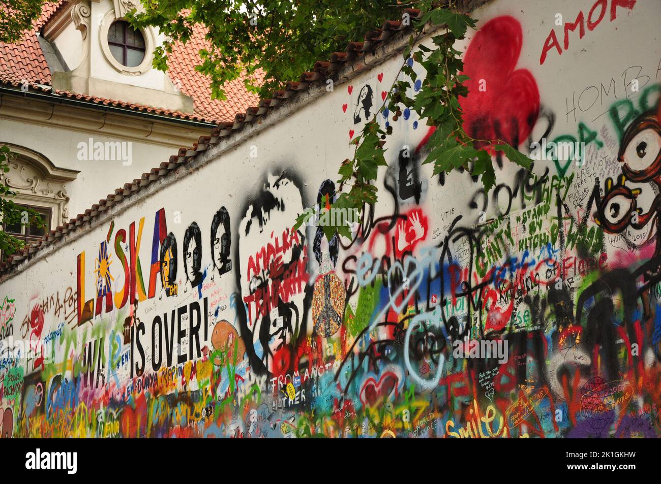 A closeup shot of colorful graffiti on the John Lennon Wall in Prague ...