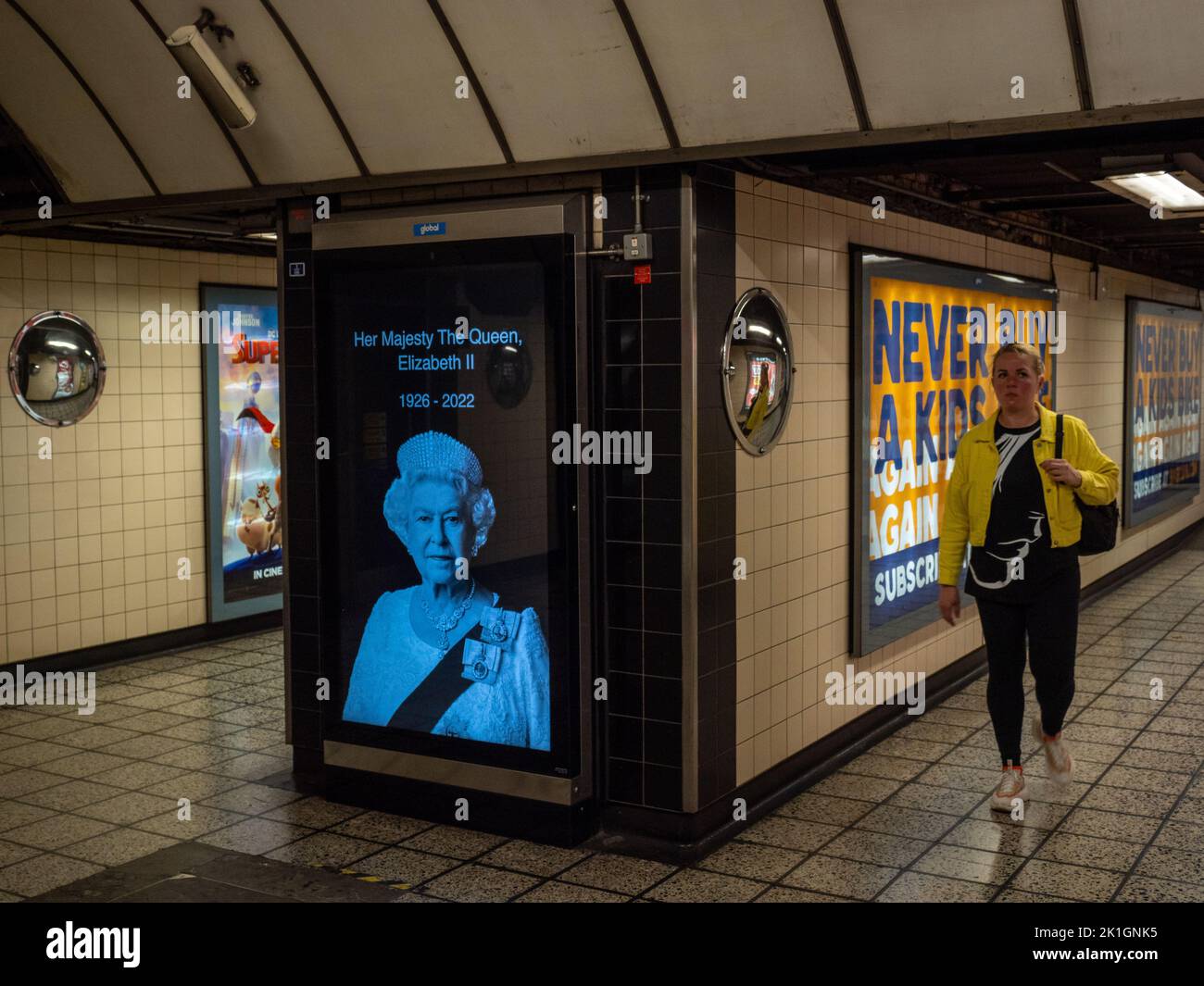 Digital posters of Queen Elizabeth II dominated underground tube and ...