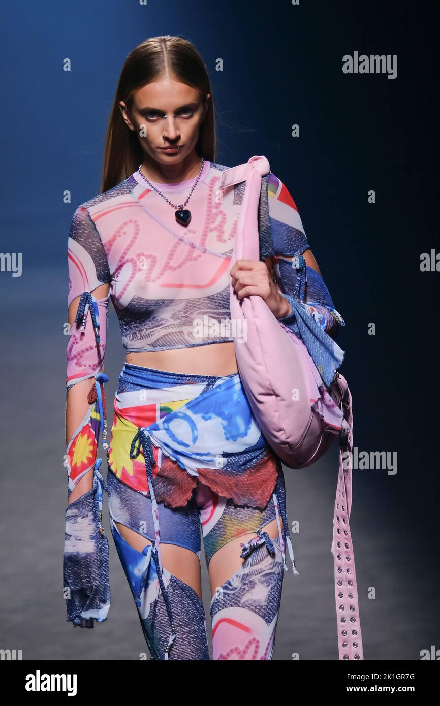 A model walks the runway wearing a creation by Crack Studio during the ...