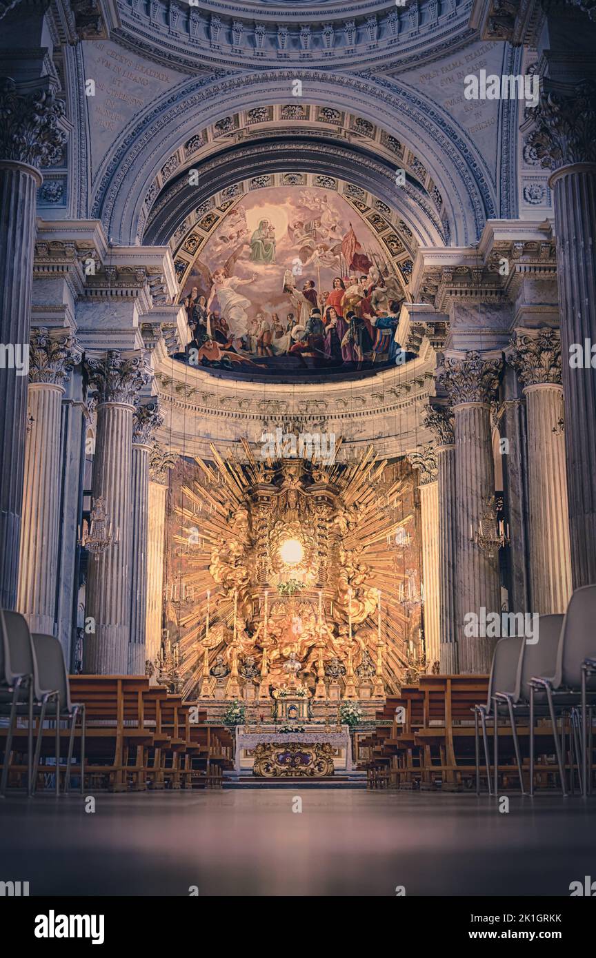 A vertical shot of Santa Maria in Campitelli church's main altar and ...