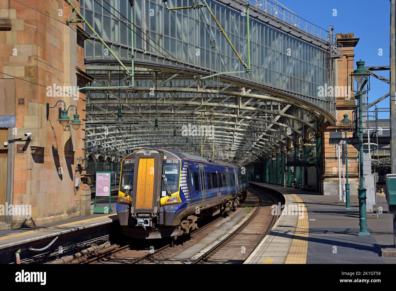 A Siemens Class 380 Desiro Electric train departs Glasgow Central ...