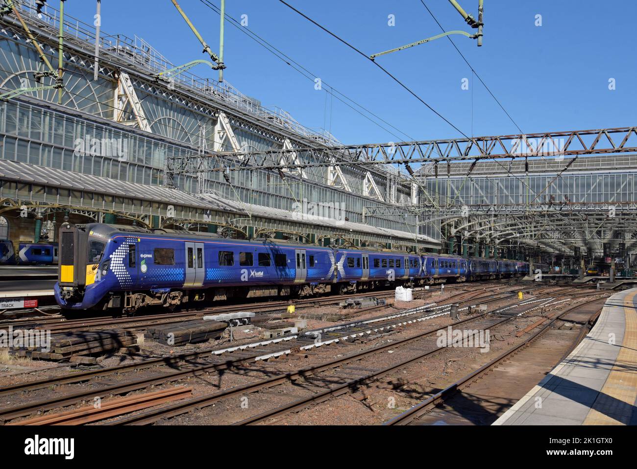 A Siemens Class 380 Desiro Electric train departs Glasgow Central ...