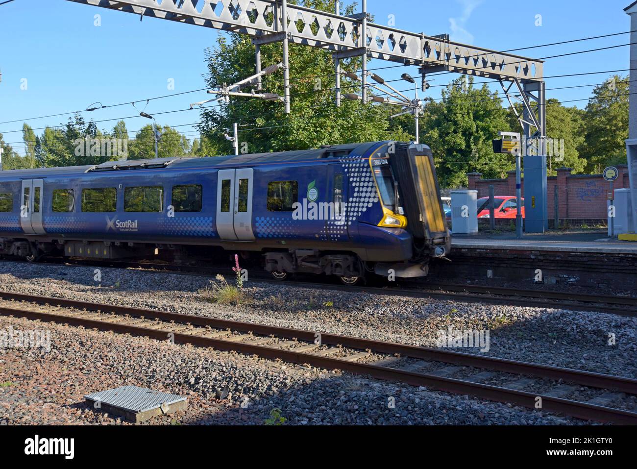 A Scotrail Class 380 Desiro electric train arrives at Cardonald Station ...
