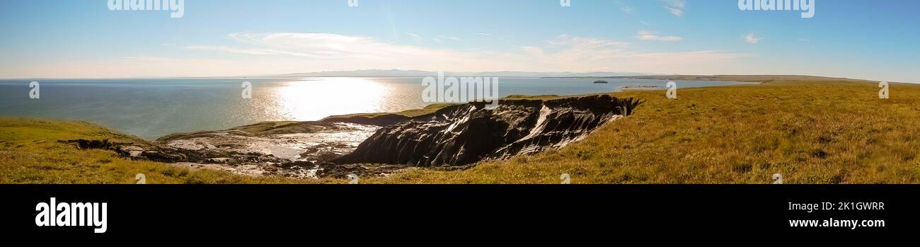Slump in cliff caused by melting permafrost on Herschel Island, Yukon ...