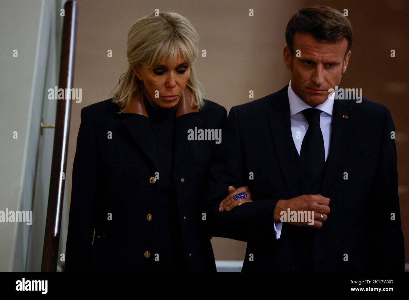 France's President Emmanuel Macron and first lady Brigitte Macron view ...