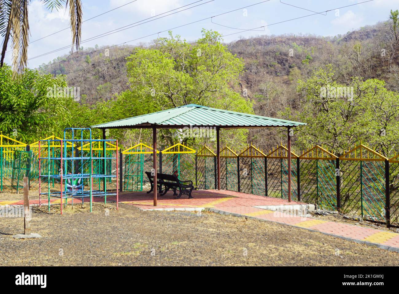 Beautiful scenic view of an hut and a bench at mountain village ...