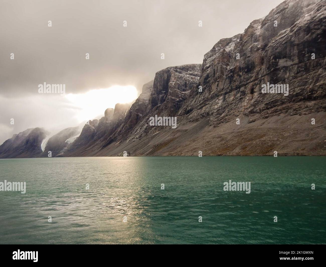 Overcast landscape of fjord in Buchan Bay, Baffin Island, Nunavut ...