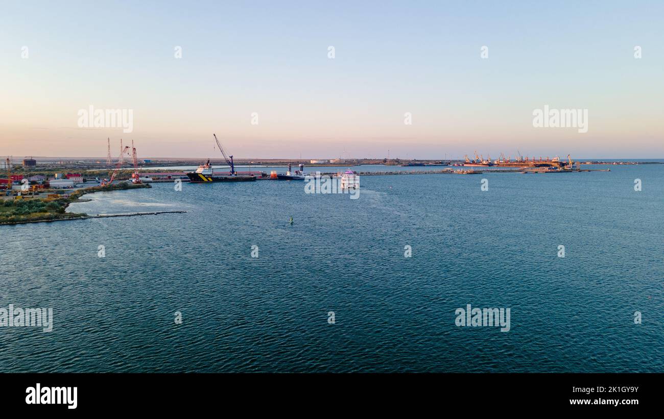 Aerial view of a harbor with ships sailing and docked. Photography was ...
