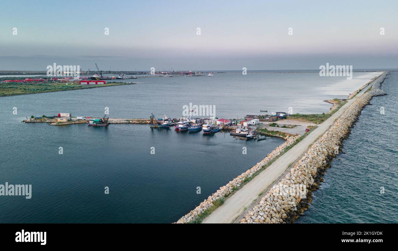 Aerial view of a harbor with boats sailing and docked. Photography was ...