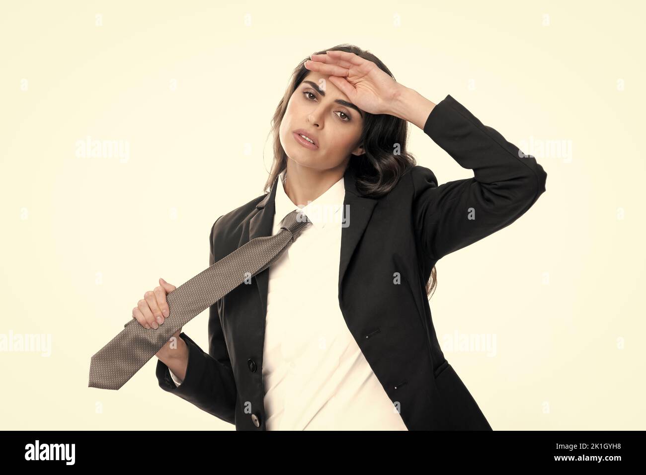 Tired business woman in suit and tie. Confident female entrepreneur ...