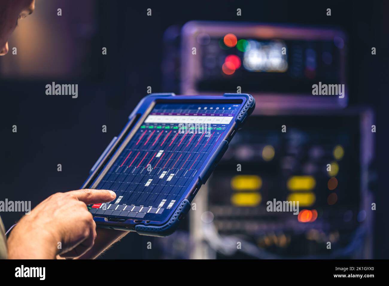 Remote control and sound settings from the tablet Stock Photo - Alamy