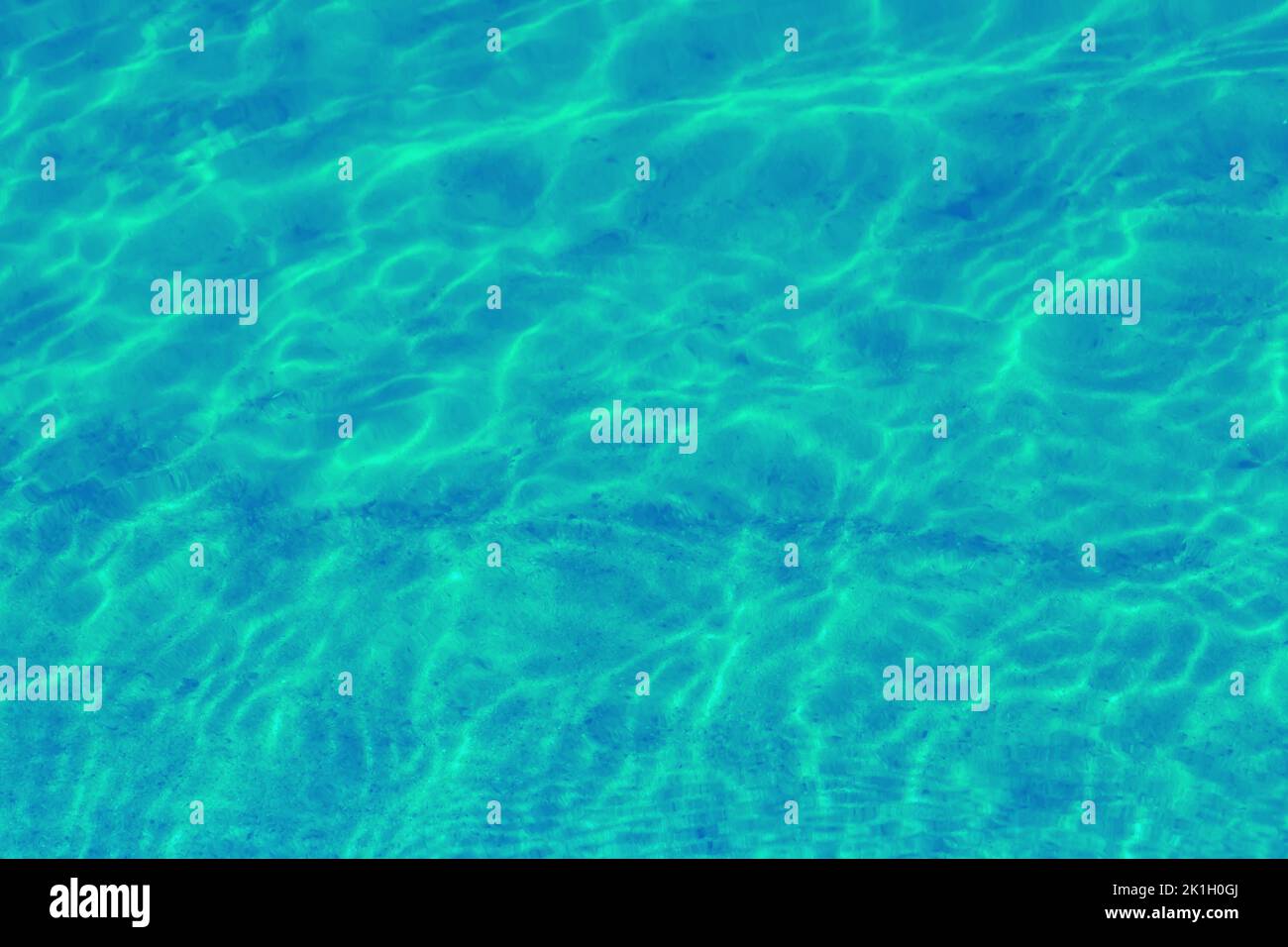 Water ripple texture background. Wavy water surface. Blue sky reflected ...
