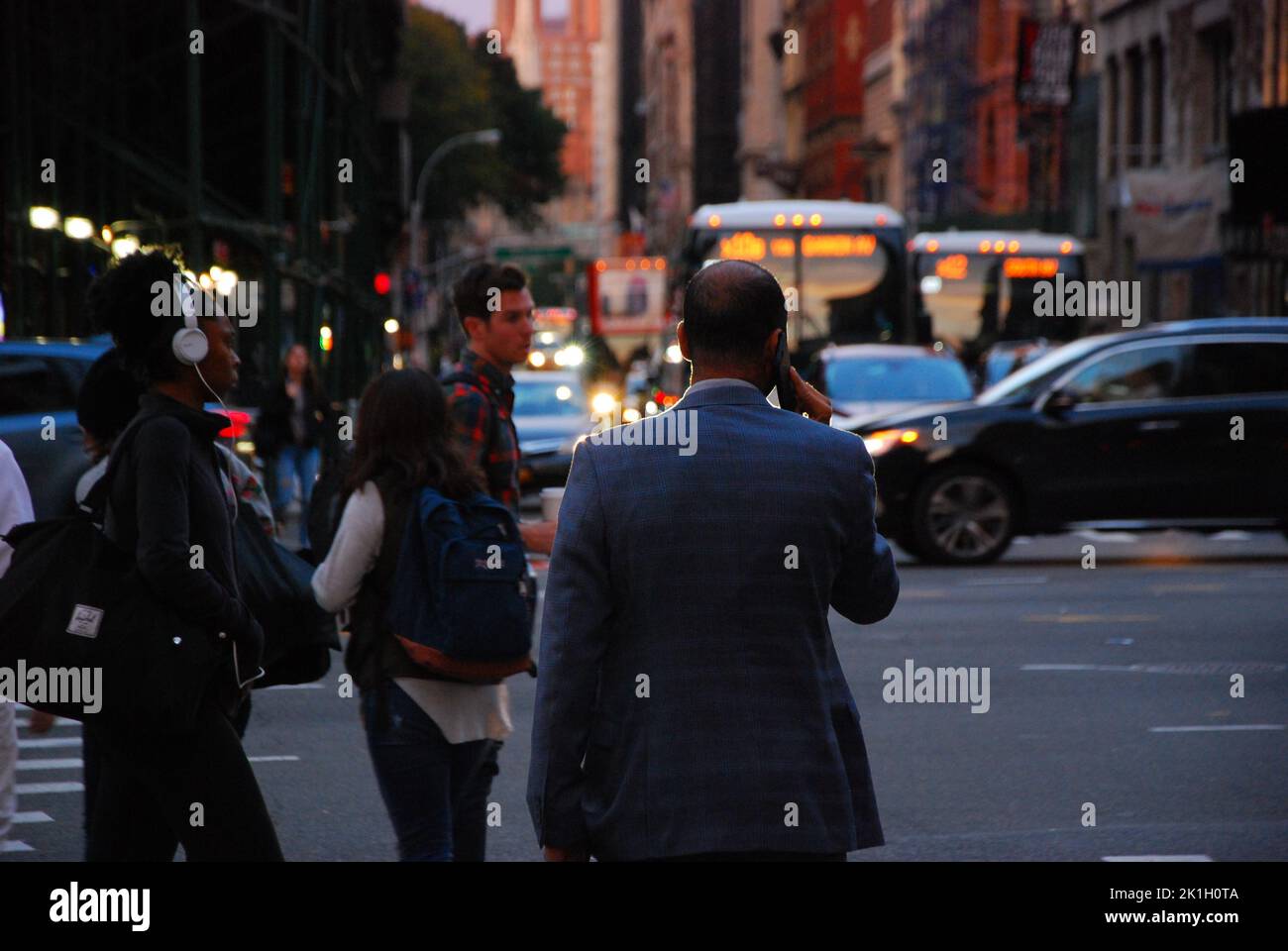 Man suit walking back hi-res stock photography and images - Alamy