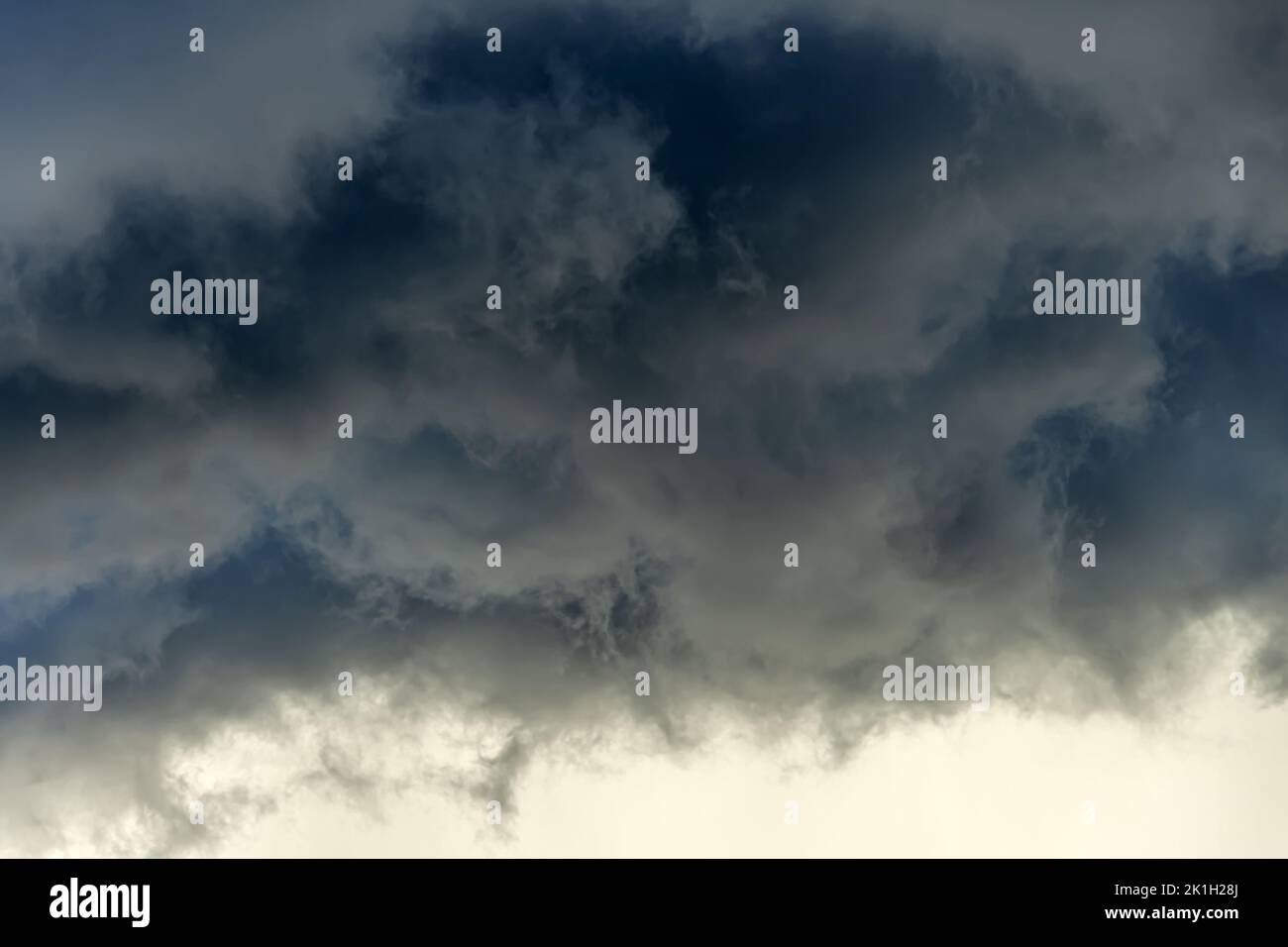 Threatening squall clouds are a sign of a heavy downpour of a bad ...