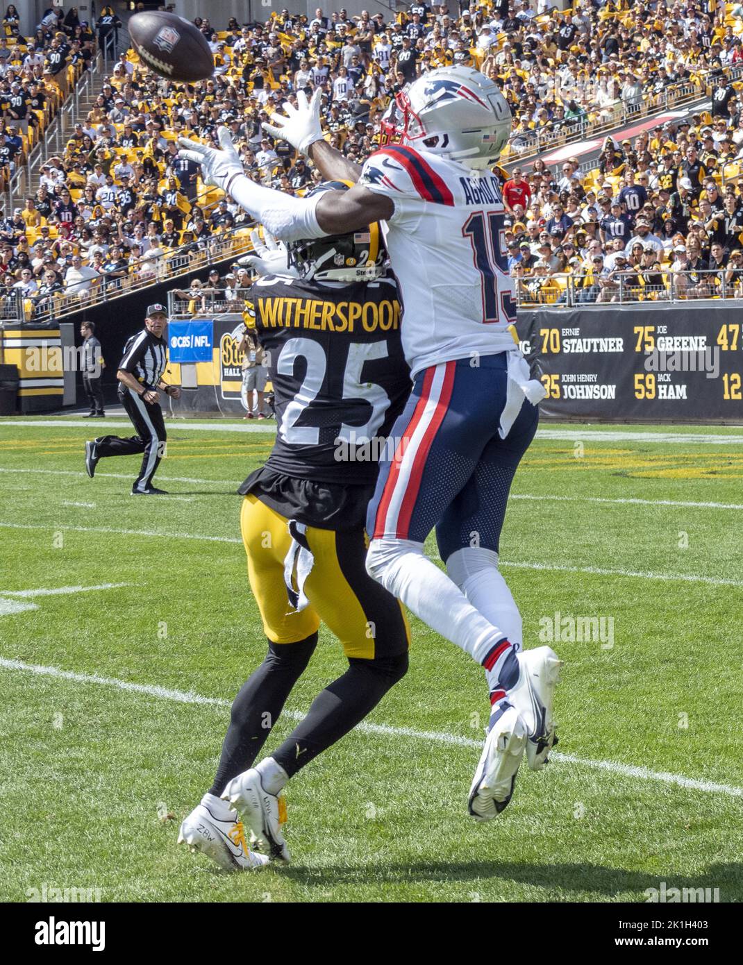New England Patriots wide receiver Nelson Agholor (15) leaps over ...