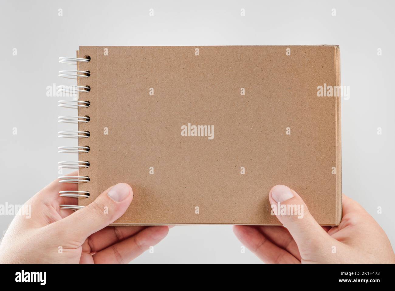 Man holding open book hi-res stock photography and images - Alamy