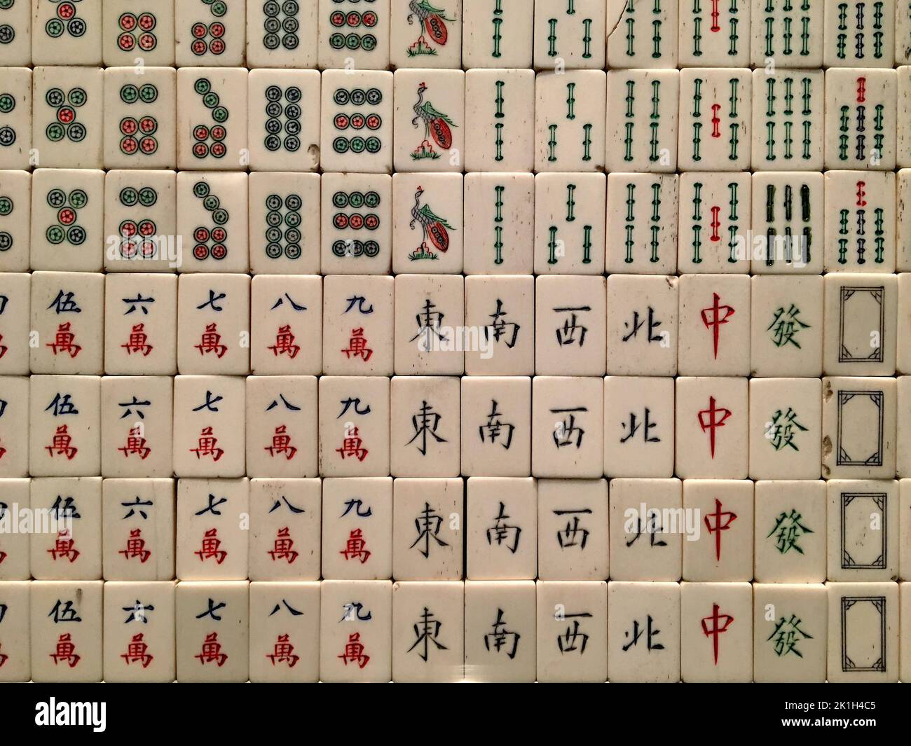 A closeup of Chinese Mahjong tiles arranged in a grid pattern Stock ...