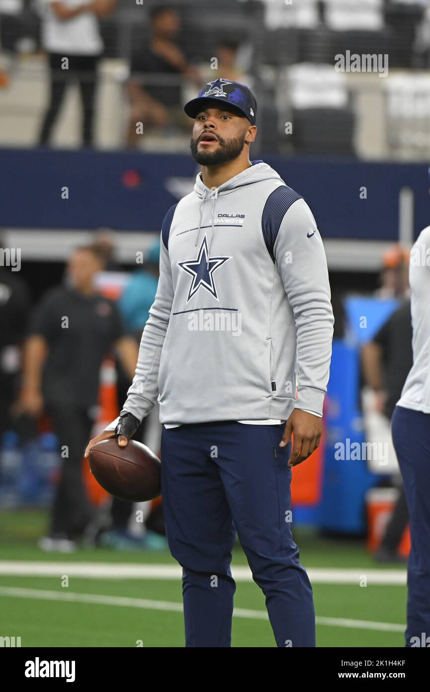 Dallas Cowboys quarterback Dak Prescott, wearing a hand cast, watches ...
