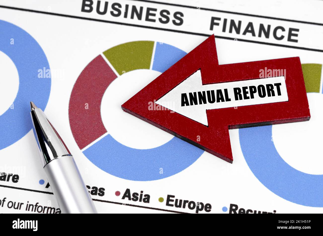 Business concept. Against the background of the diagrams, an arrow with ...