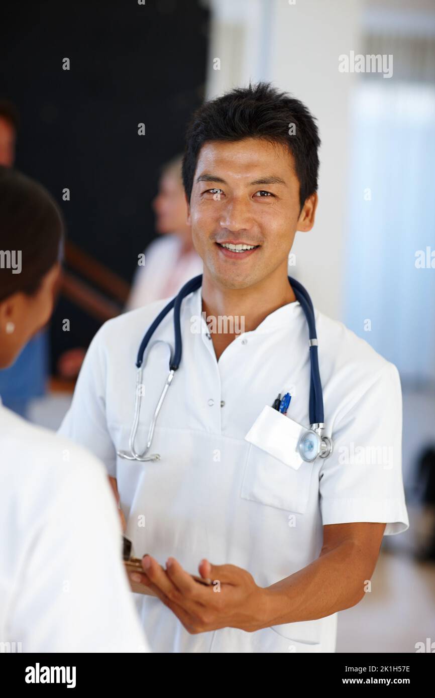 Happy male doctor laughing portrait hi-res stock photography and images ...