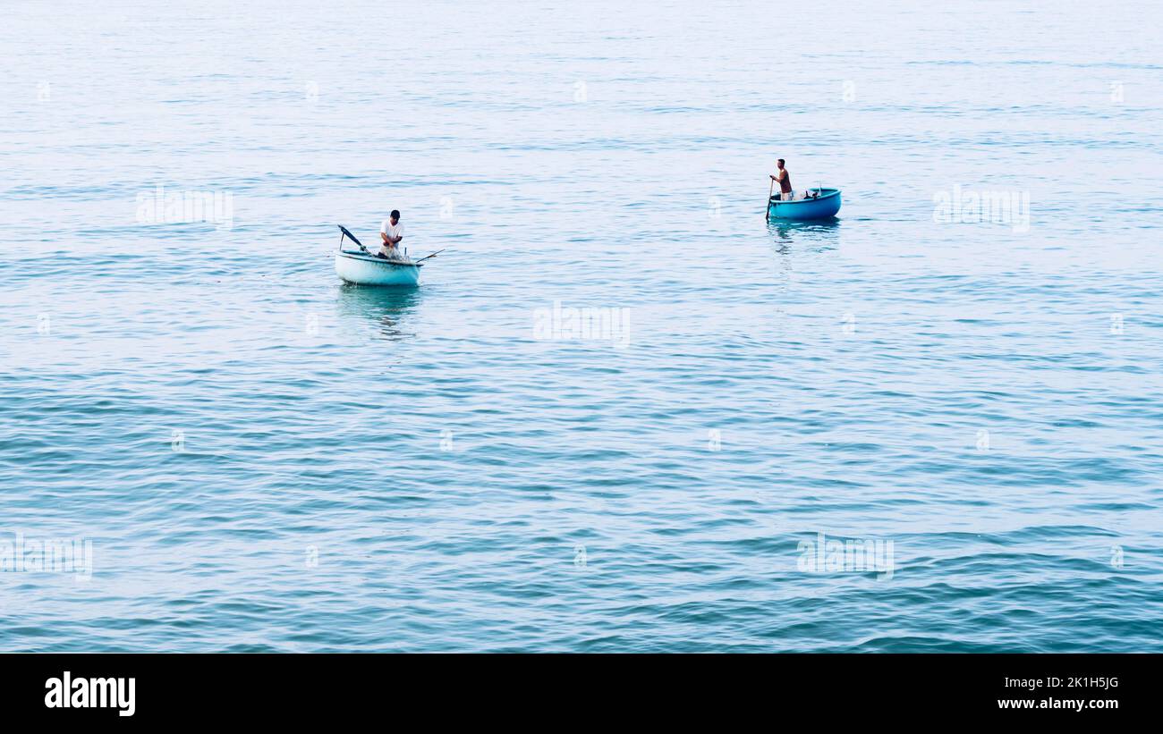 Simple background Calm dark blue sea fishing boats alone white pale ...