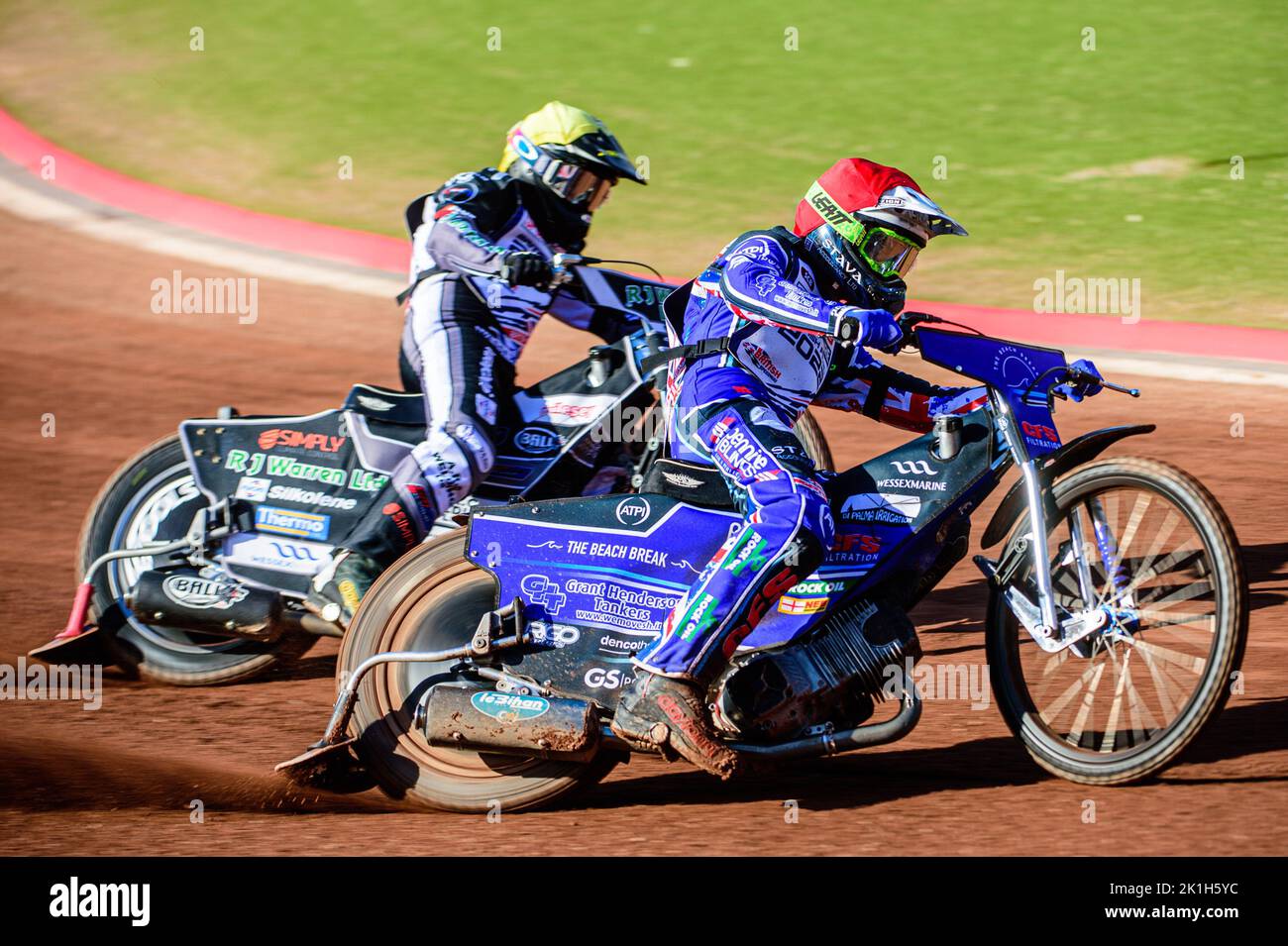 Adam Ellis (Red) passes Danny King (Yellow) during the Sports Insure ...
