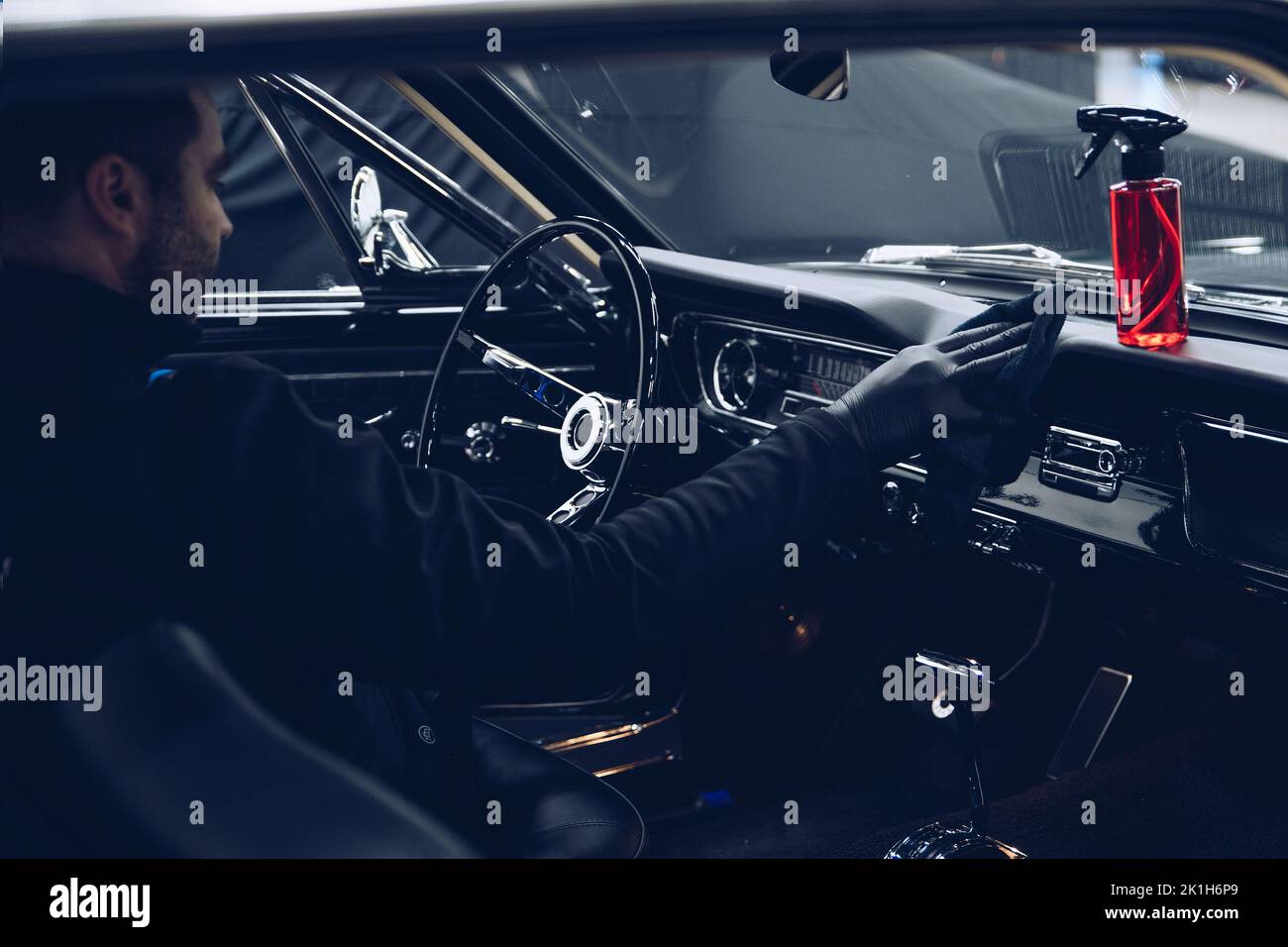 Car detailing or car wash employee cleans the interior of the car Stock ...