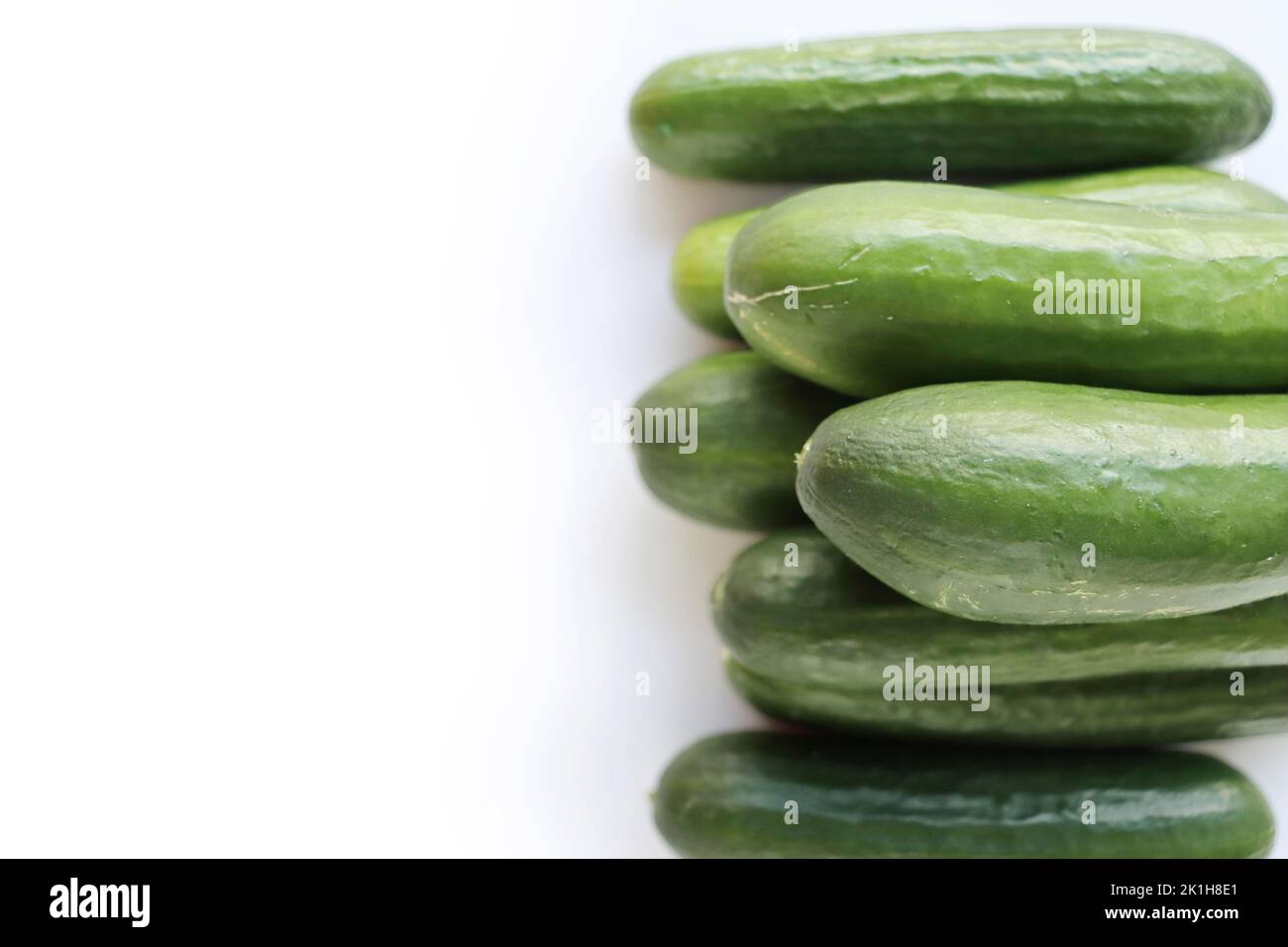 Isolated Heap of green Cucumbers, group of fresh cucumbers on the white ...