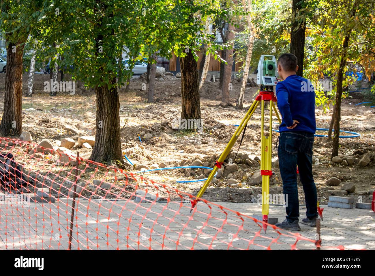 surveyor on the construction of the yard. construction in the city ...