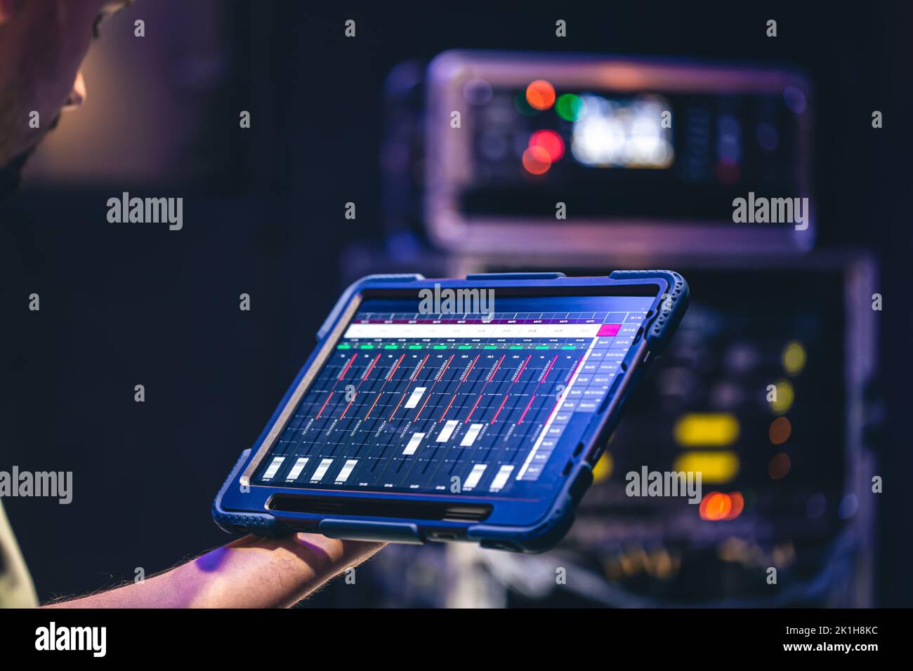 Remote control and sound settings from the tablet Stock Photo - Alamy