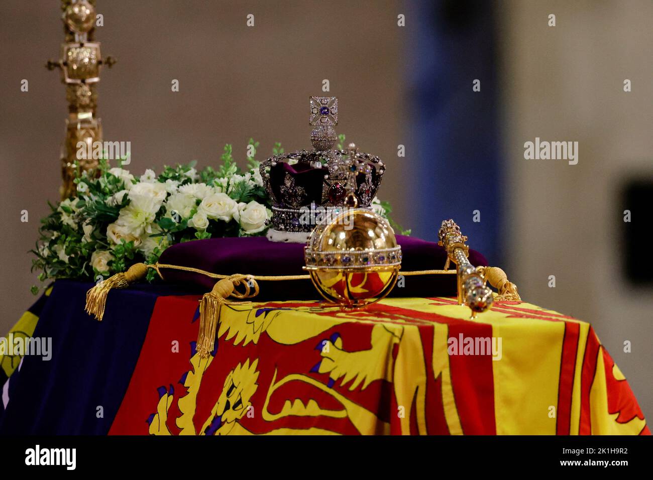 The coffin of Queen Elizabeth II, draped in the Royal Standard with the ...