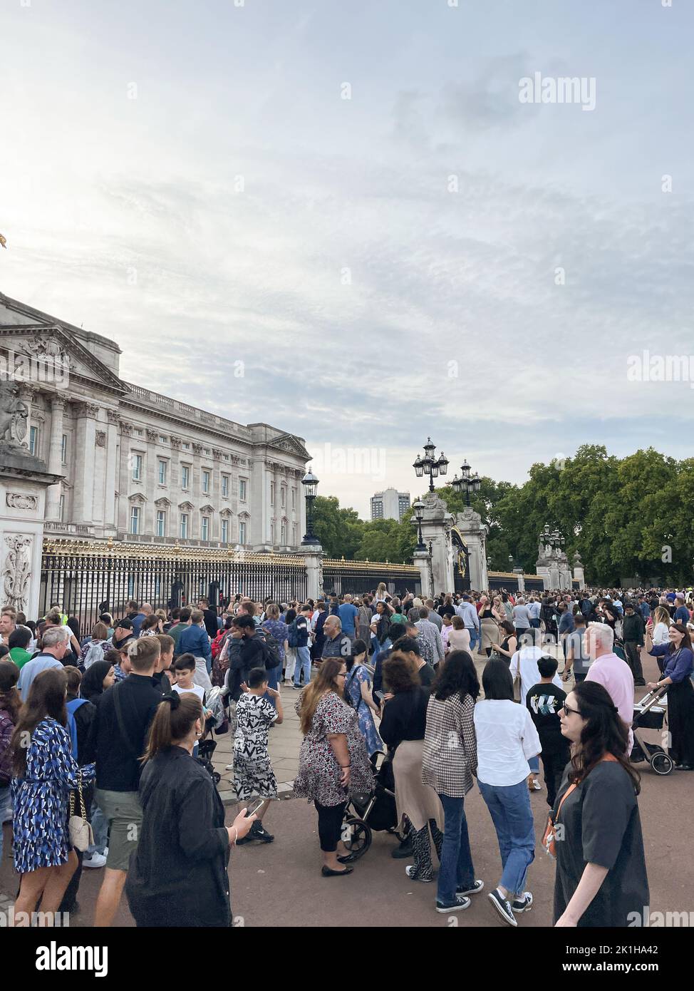 London, UK - September 11 2022: People mourning outside Buckingham Palace on the announcement of ...