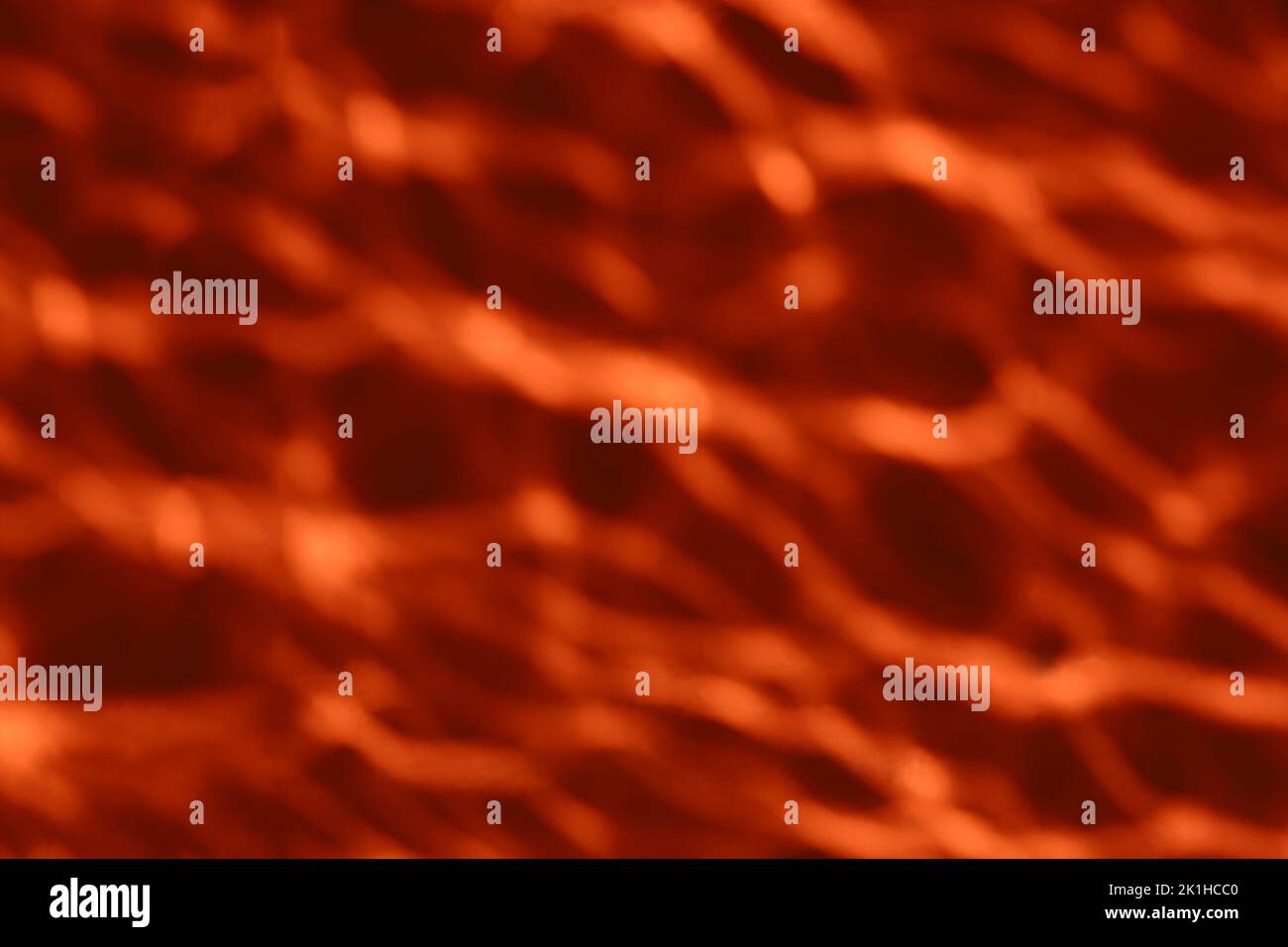 Abstract background material in which the morning sunlight reflecting ...