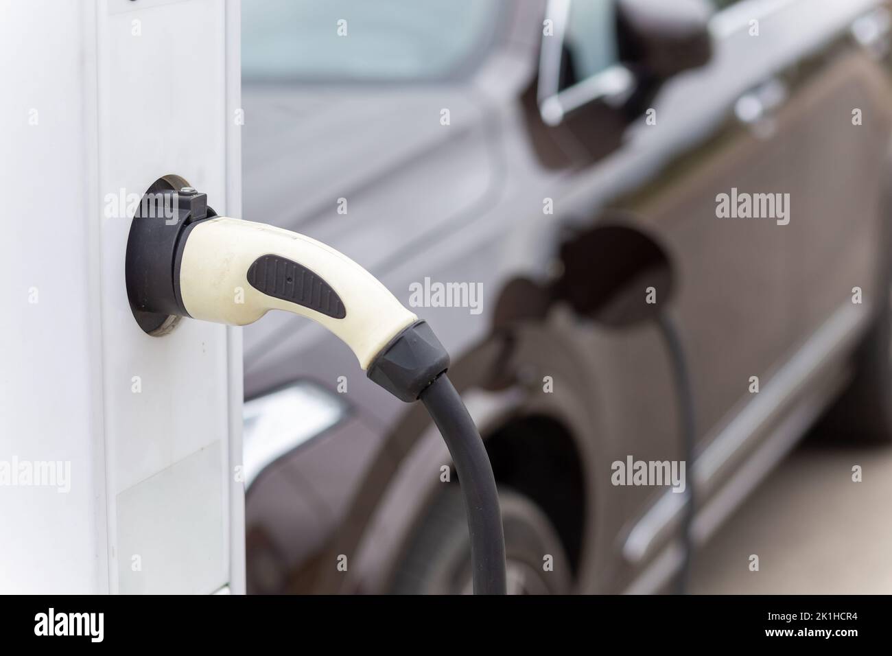 Power supply connect to electric vehicle for charge to the battery ...