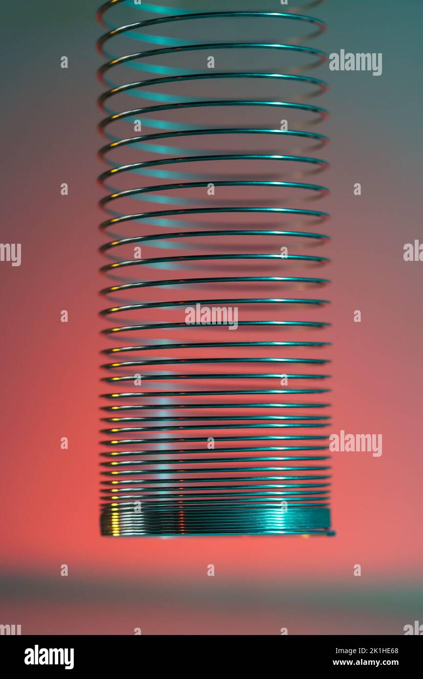 Closeup of coiled metal spring with sufficiently high strength and ...