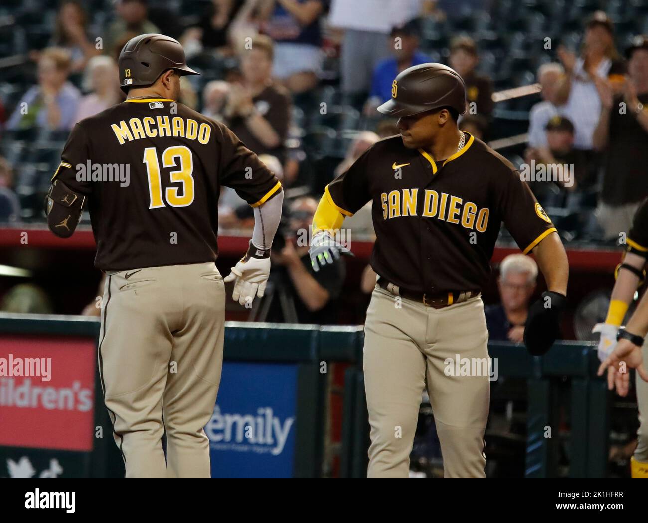 Phoenix, Arizona, USA. 18th Sep, 2022. Manny Machado (13) of the San Diego Padres hits a 2 run ...