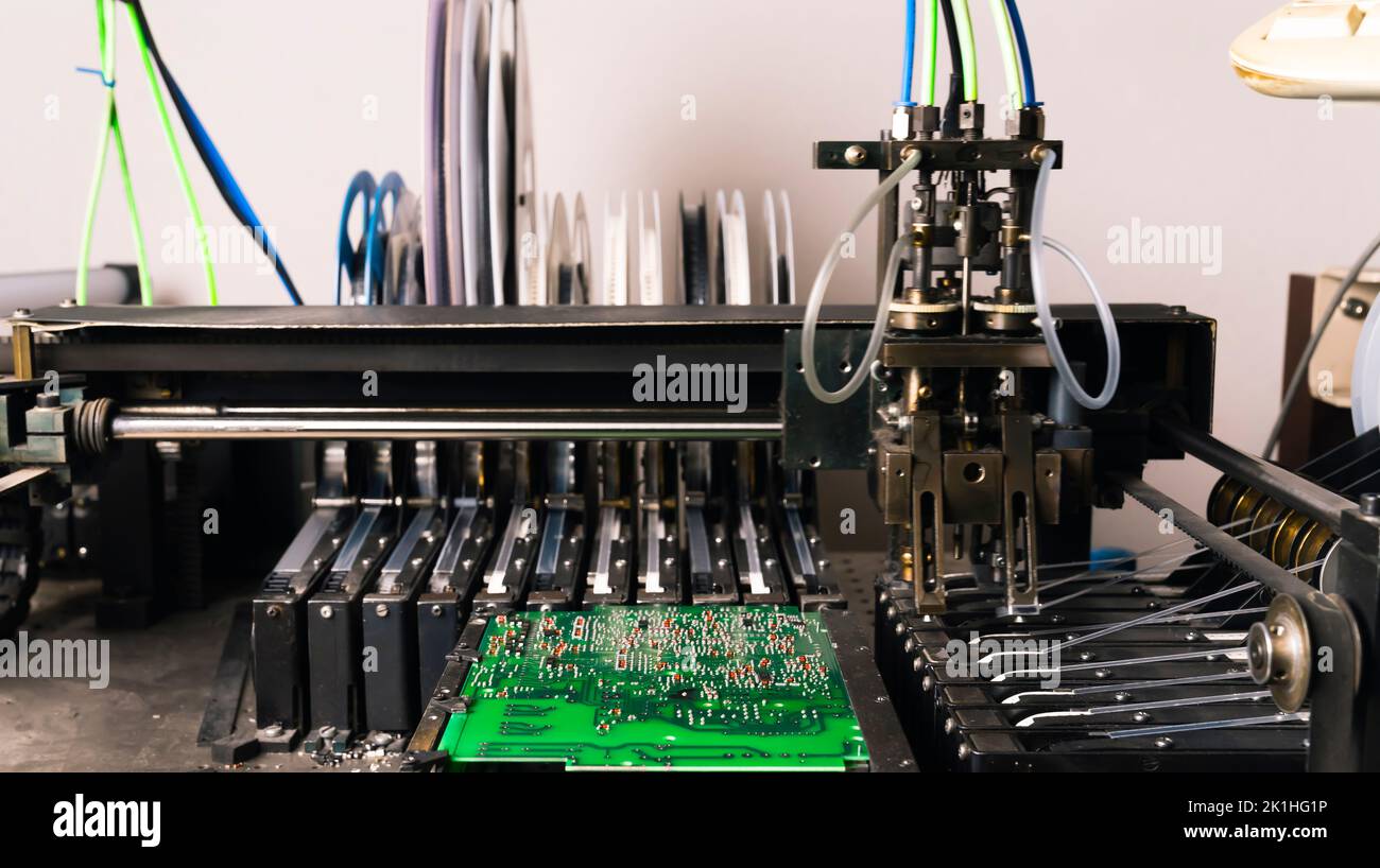SMD surface-mount technology device in the process of assembling parts ...