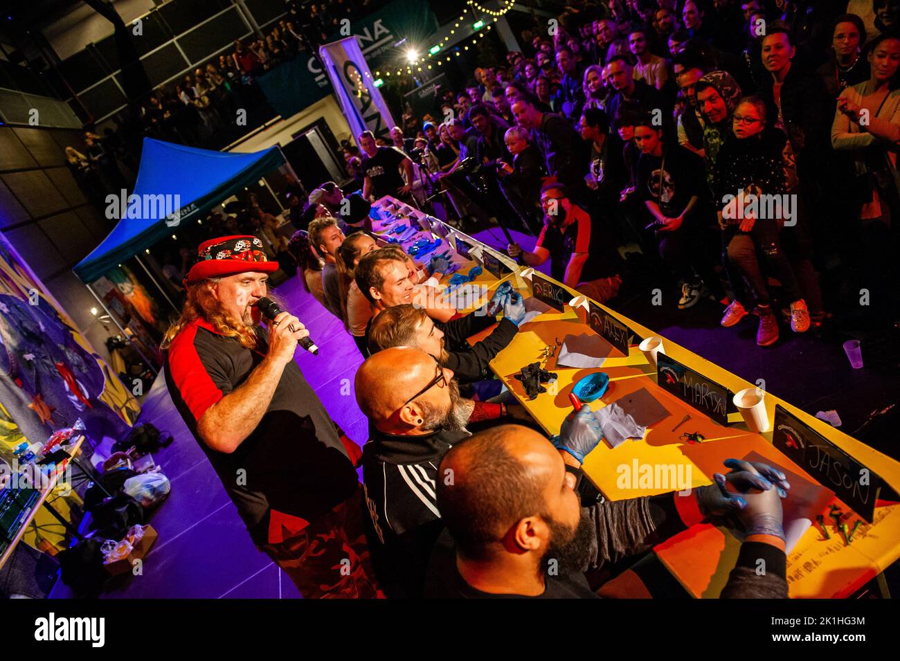 The host checks that each participant has finished their peppers during ...