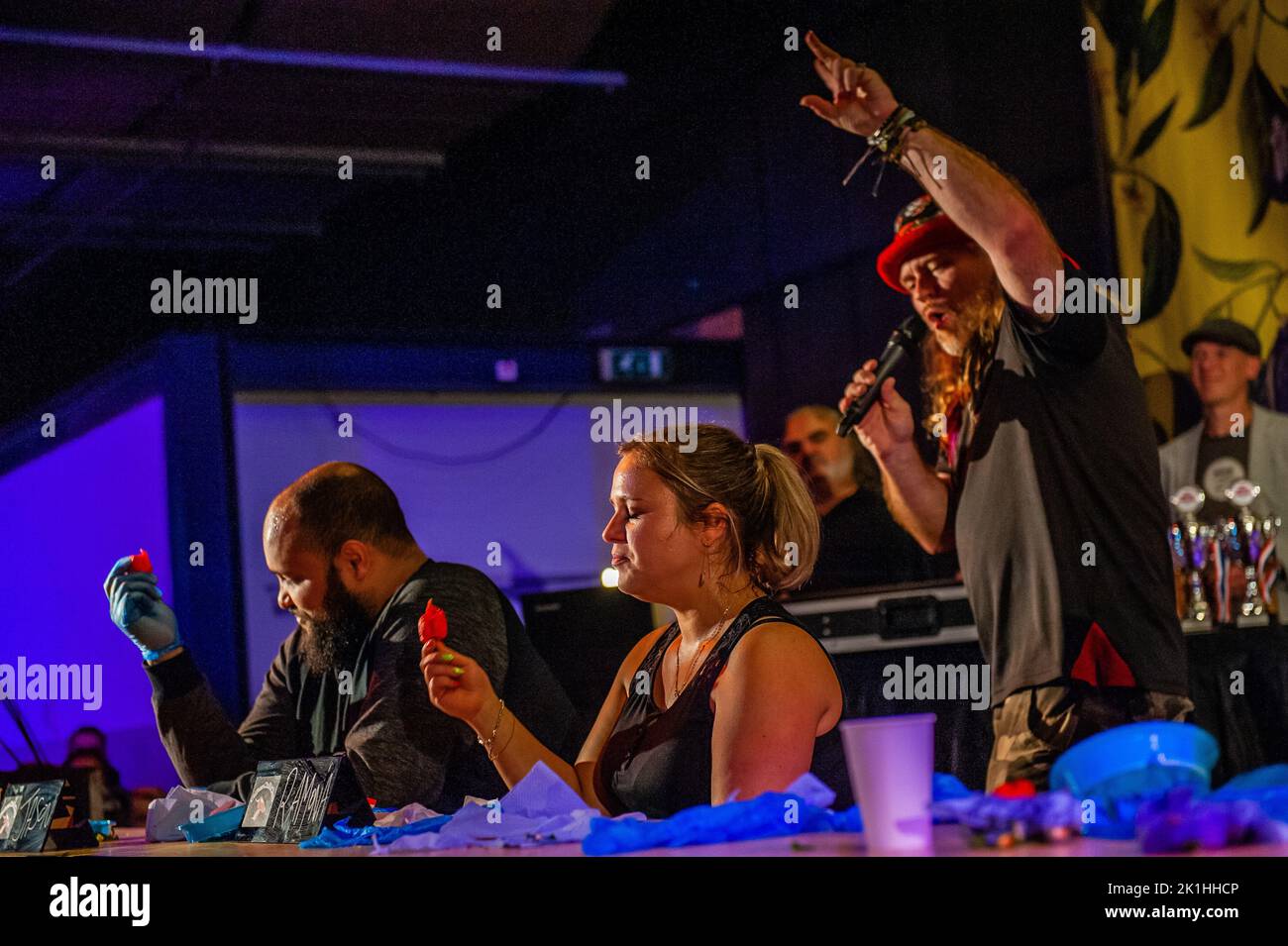 The last two participants are seen eating the last chili peppers during ...