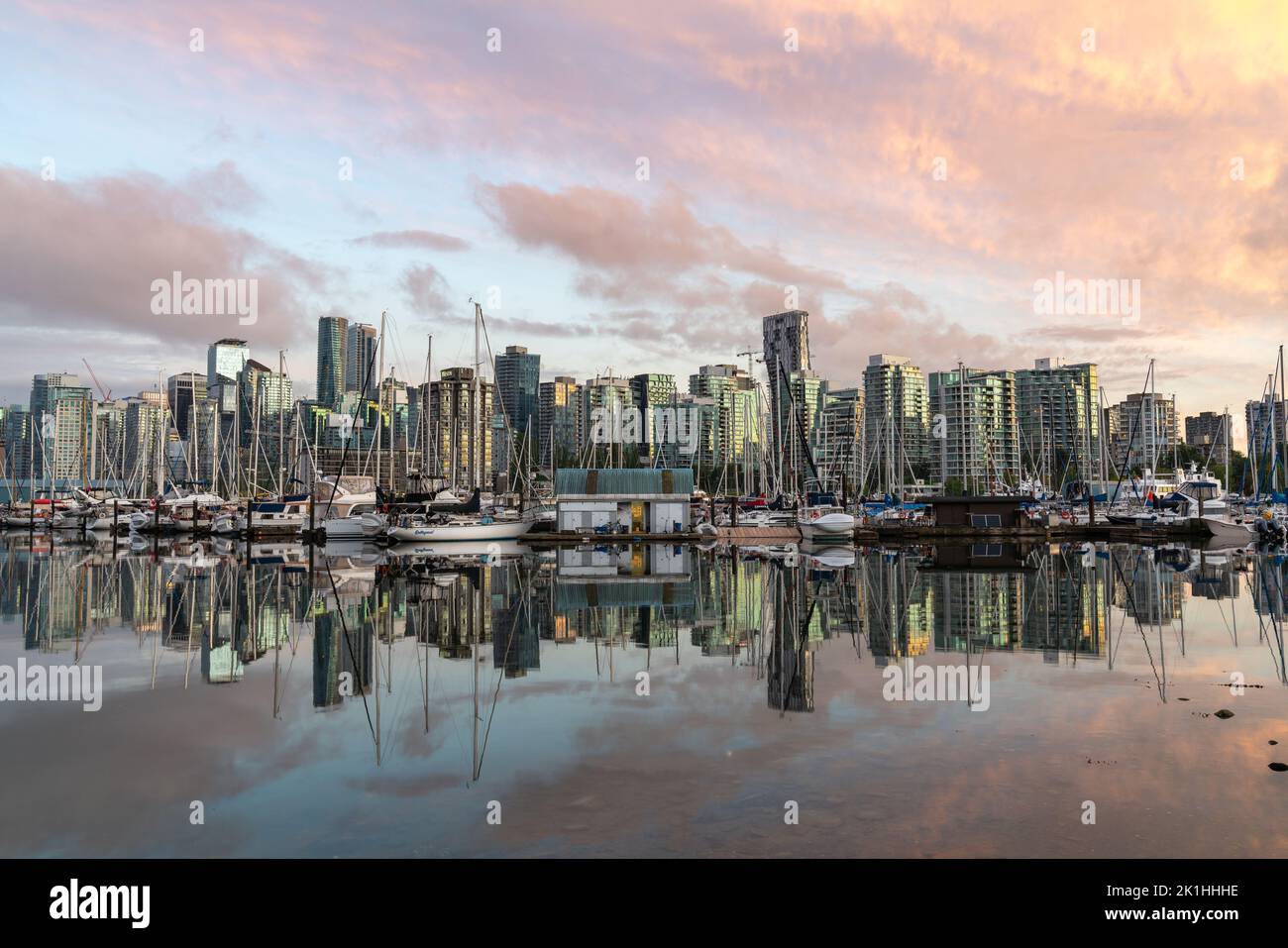 Gorgeous reflection view of the Vancouver skyline in Vancouver Harbor ...