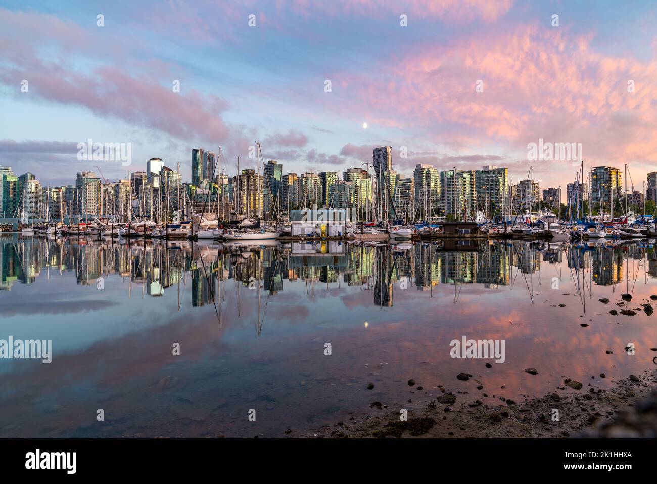 Gorgeous reflection view of the Vancouver skyline in Vancouver Harbor ...