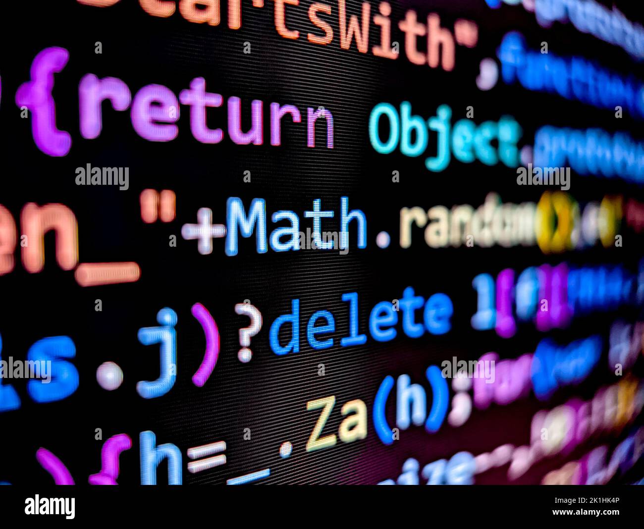 Pixelated view of computer code displayed on a laptop screen with ...