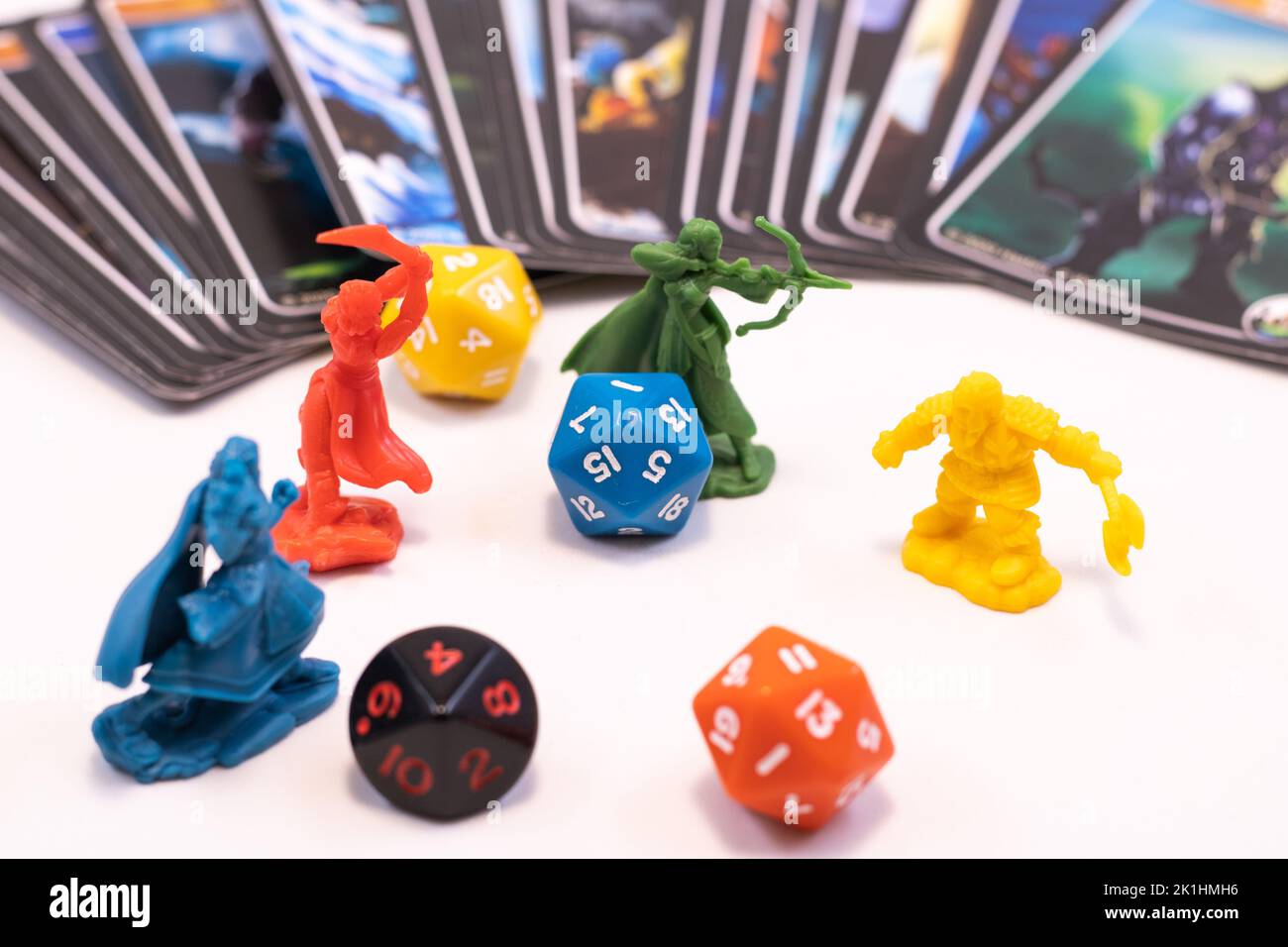 Role play game figures dices and cards Stock Photo - Alamy