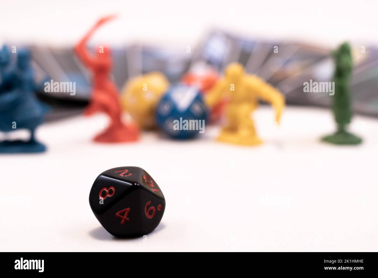 Role play game figures dices and cards Stock Photo - Alamy