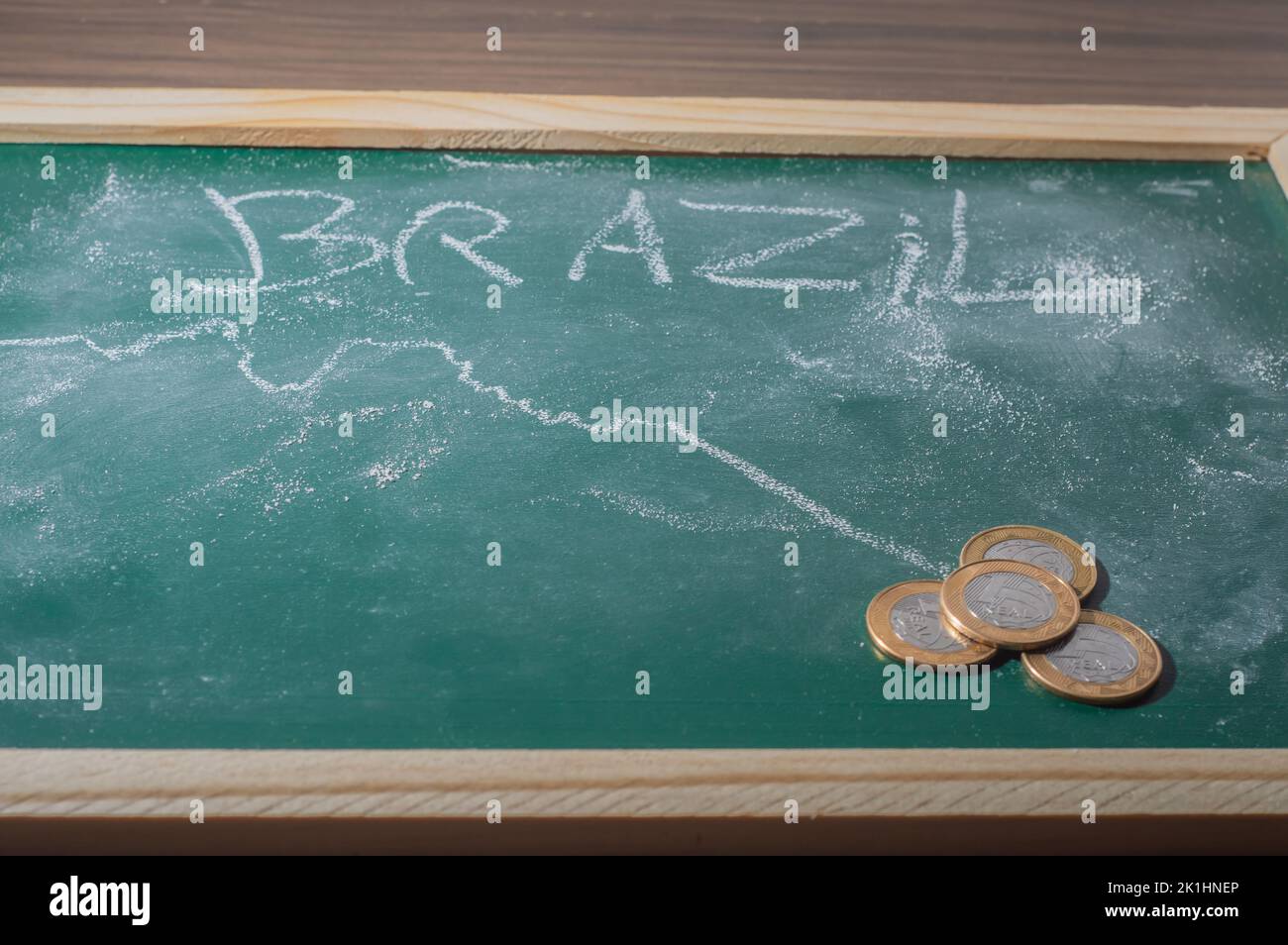 Green chalkboard With the word "Brazil" written with white chalk and a ...